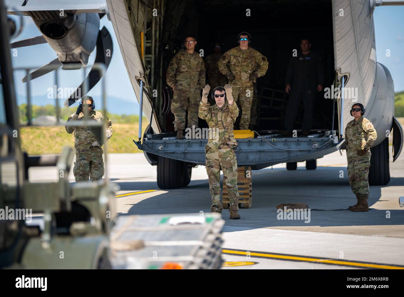 U.S. Air Force Airmen assigned to the 374th Logistics Readiness Squadron at Yokota Air Base taxi ...