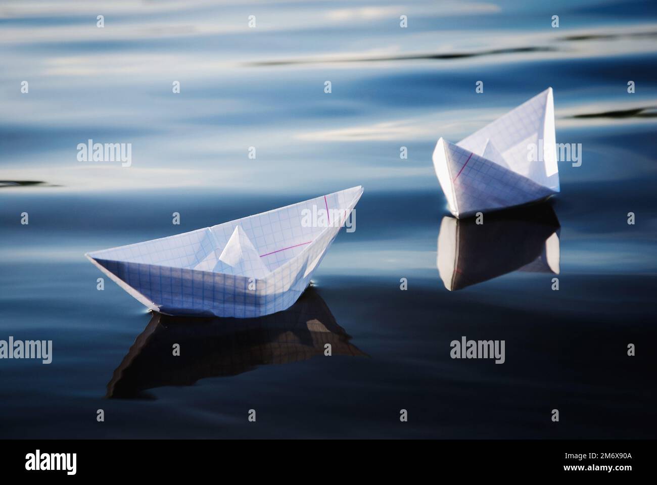 Blue white sailboat floating hi-res stock photography and images - Alamy