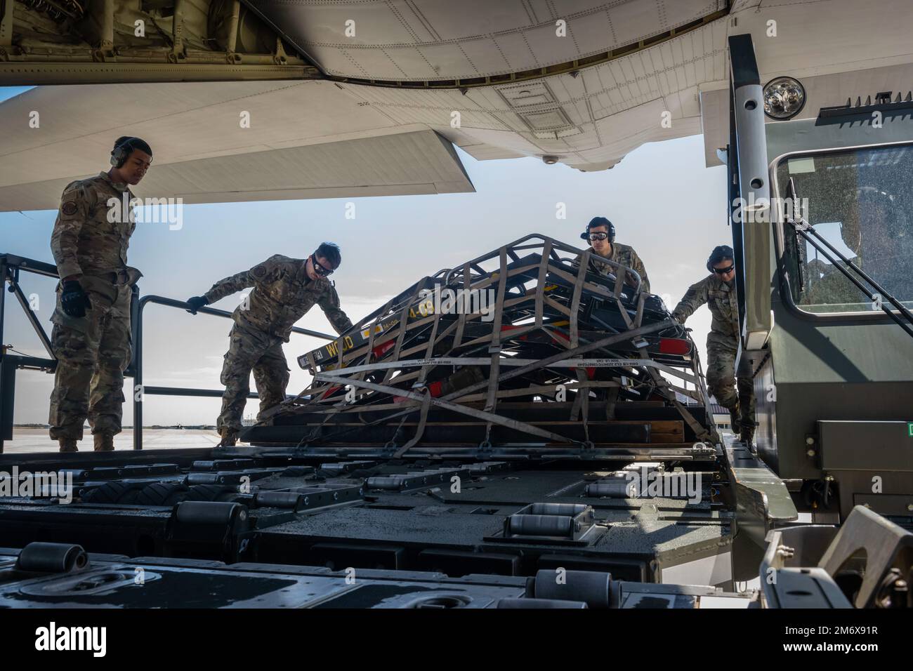 U.S. Air Force Airmen assigned to the 374th Logistics Readiness ...