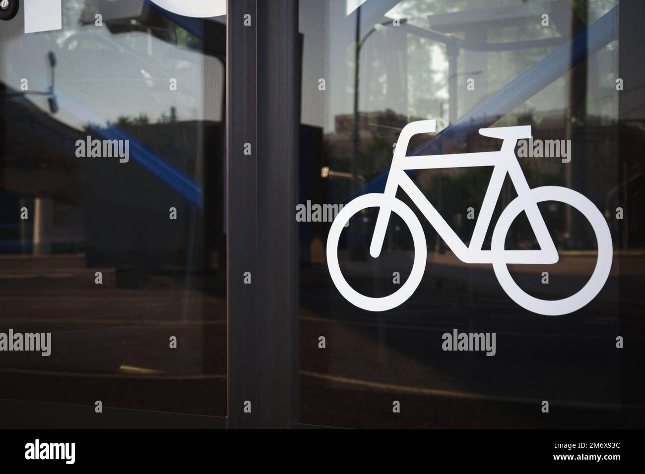 Bicycle icon on a bus door Stock Photo - Alamy