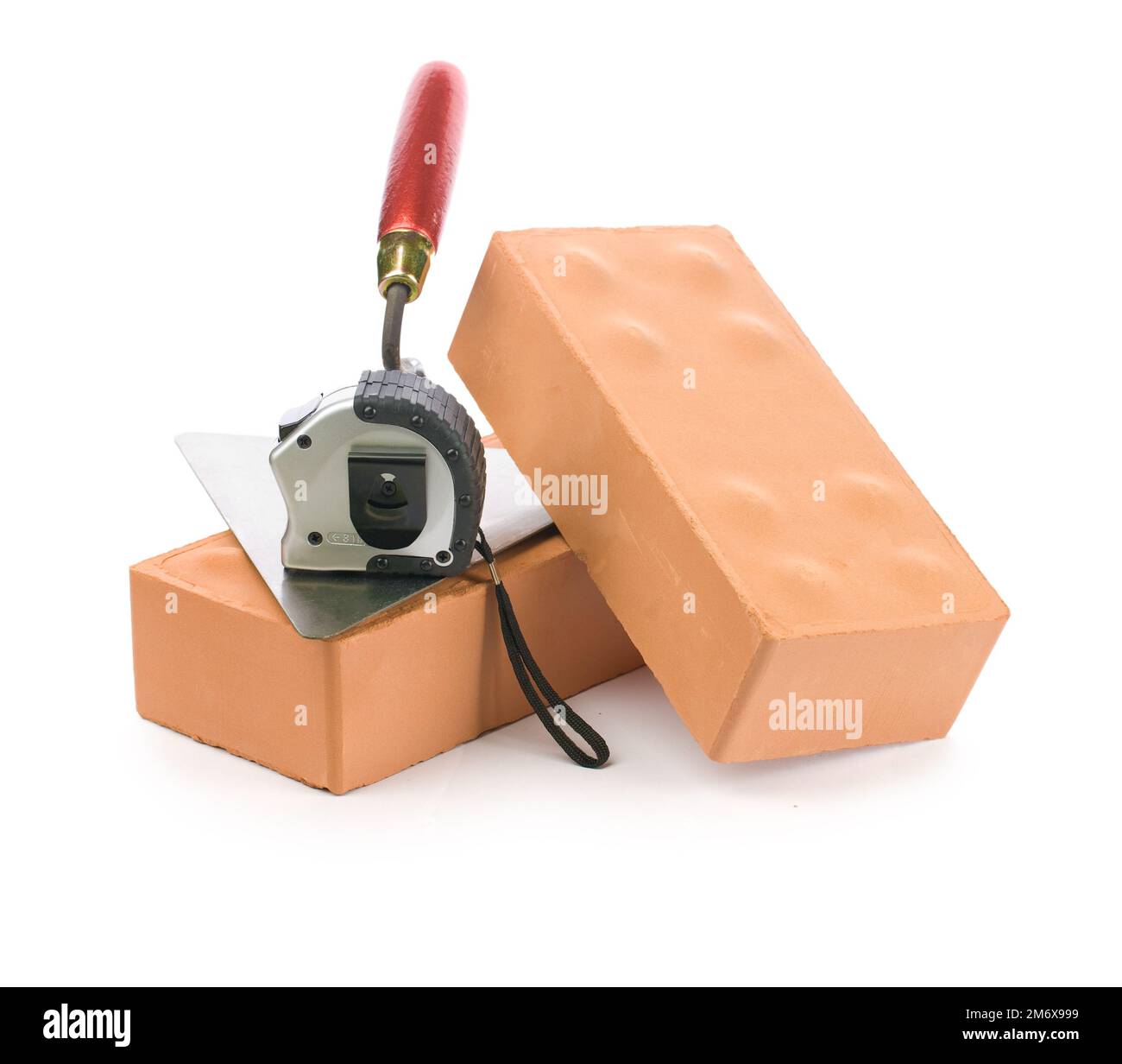 bricks trowel and tapeline Stock Photo - Alamy