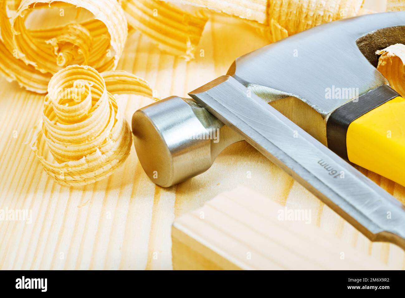 carpenter chisel on hammer and boards Stock Photo - Alamy