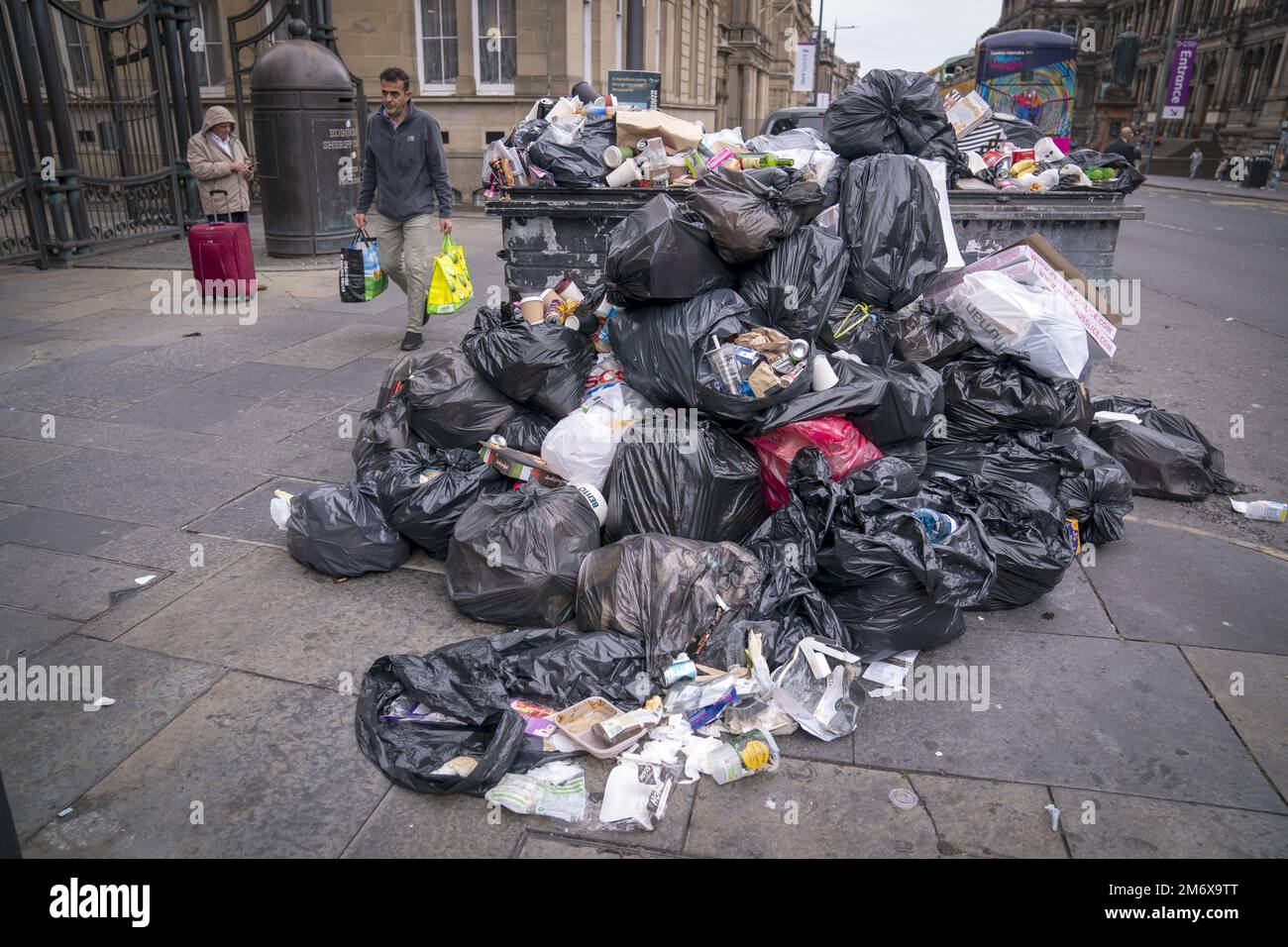 File photo dated 22/08/22 of bins and litter along Chambers Street in ...