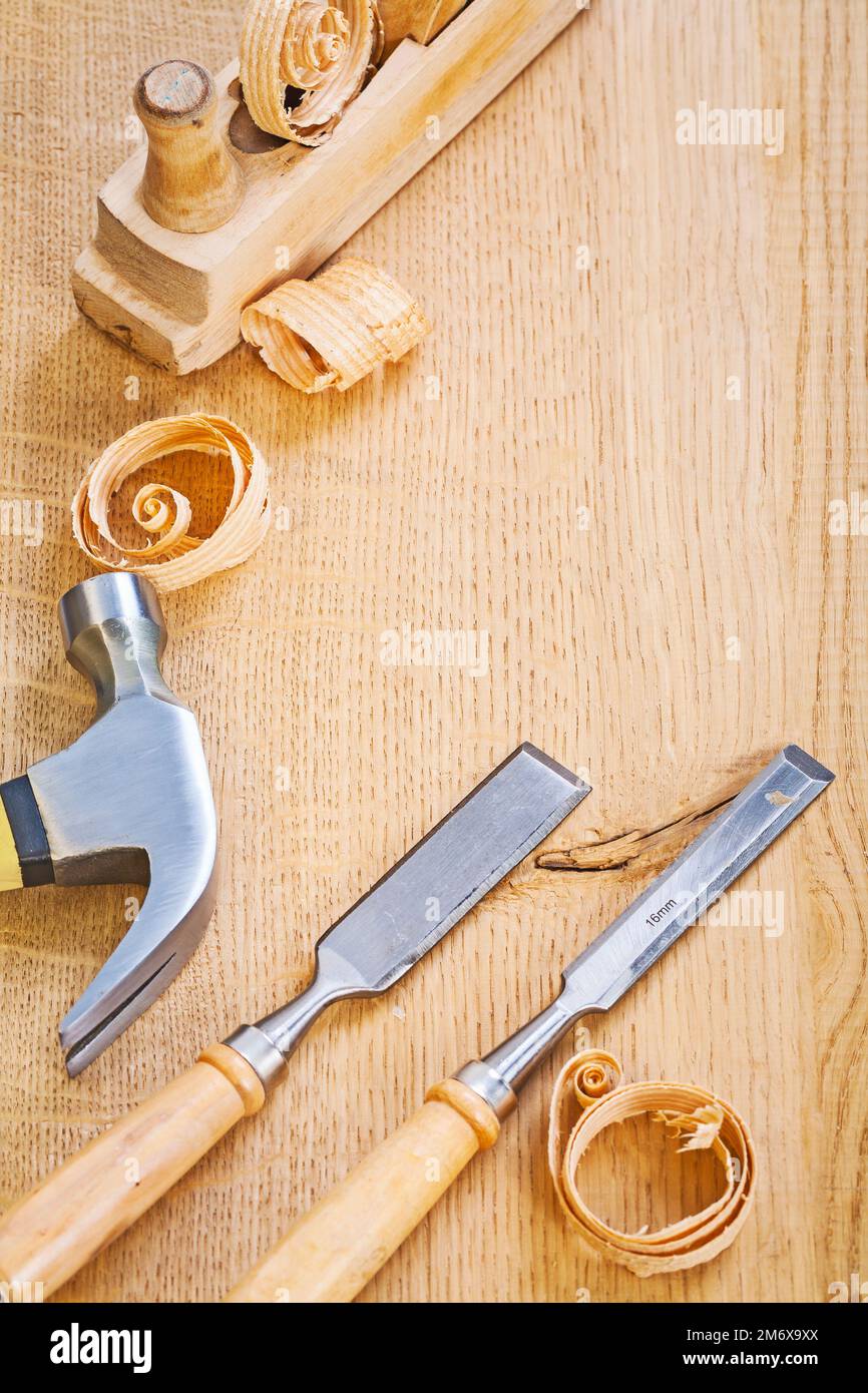 chisels claw hammer and woodworkes plane Stock Photo - Alamy