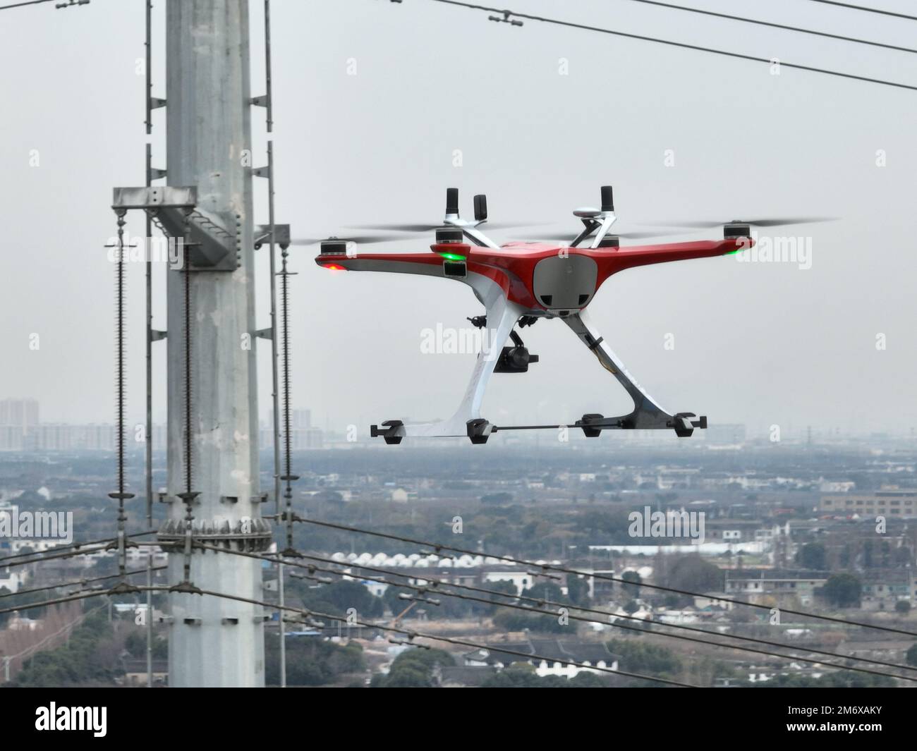 (230106) -- NANJING, Jan. 6, 2023 (Xinhua) -- An unmanned drone with ...