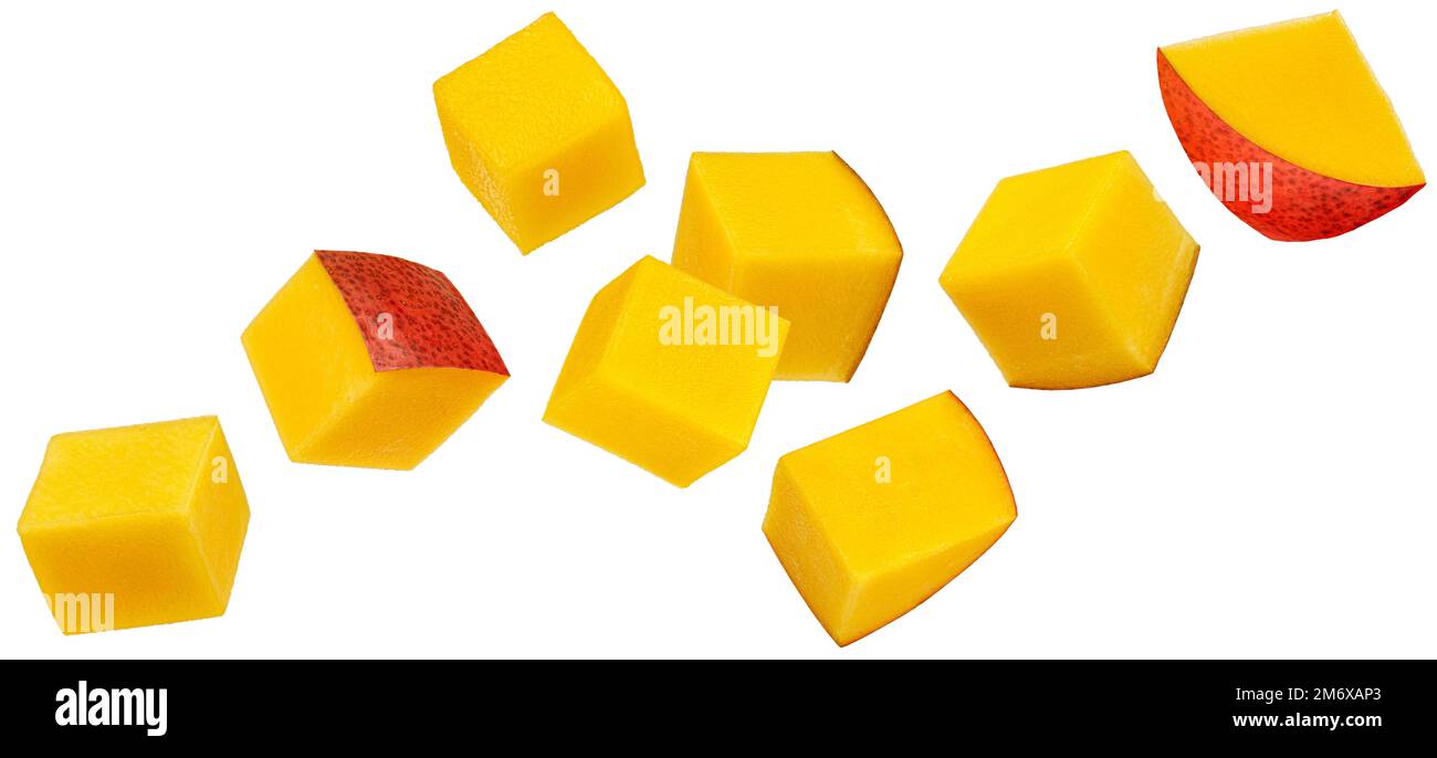 Mango cube slices isolated on white background Stock Photo - Alamy