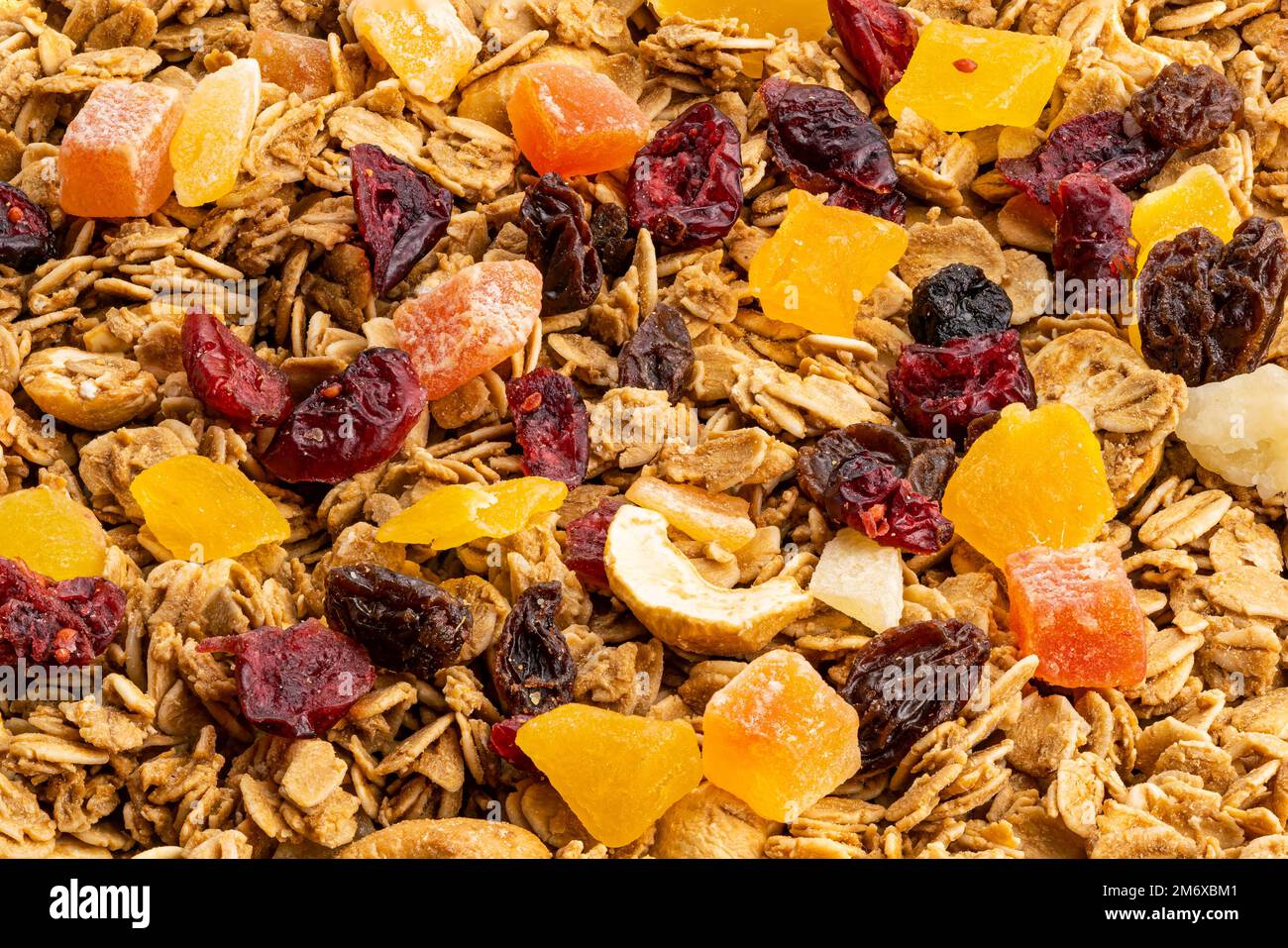 Muesli cereal breakfast and preserved tropical fruit Stock Photo - Alamy