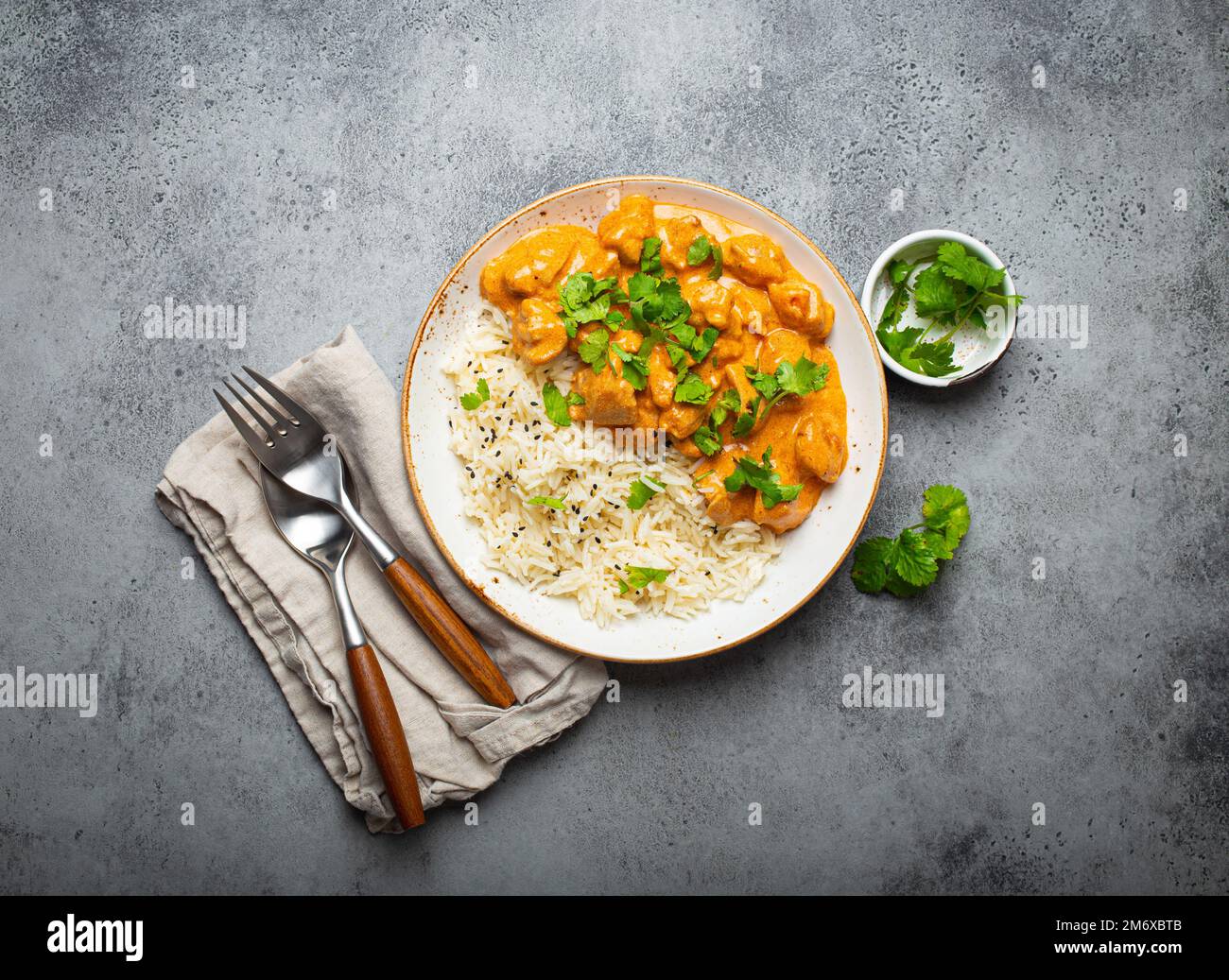 Traditional Indian dish chicken curry with basmati rice and fresh ...