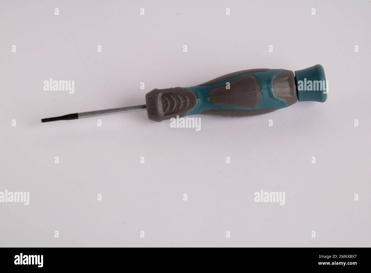 photo screwdriver metal with rubber handle on white background Stock ...