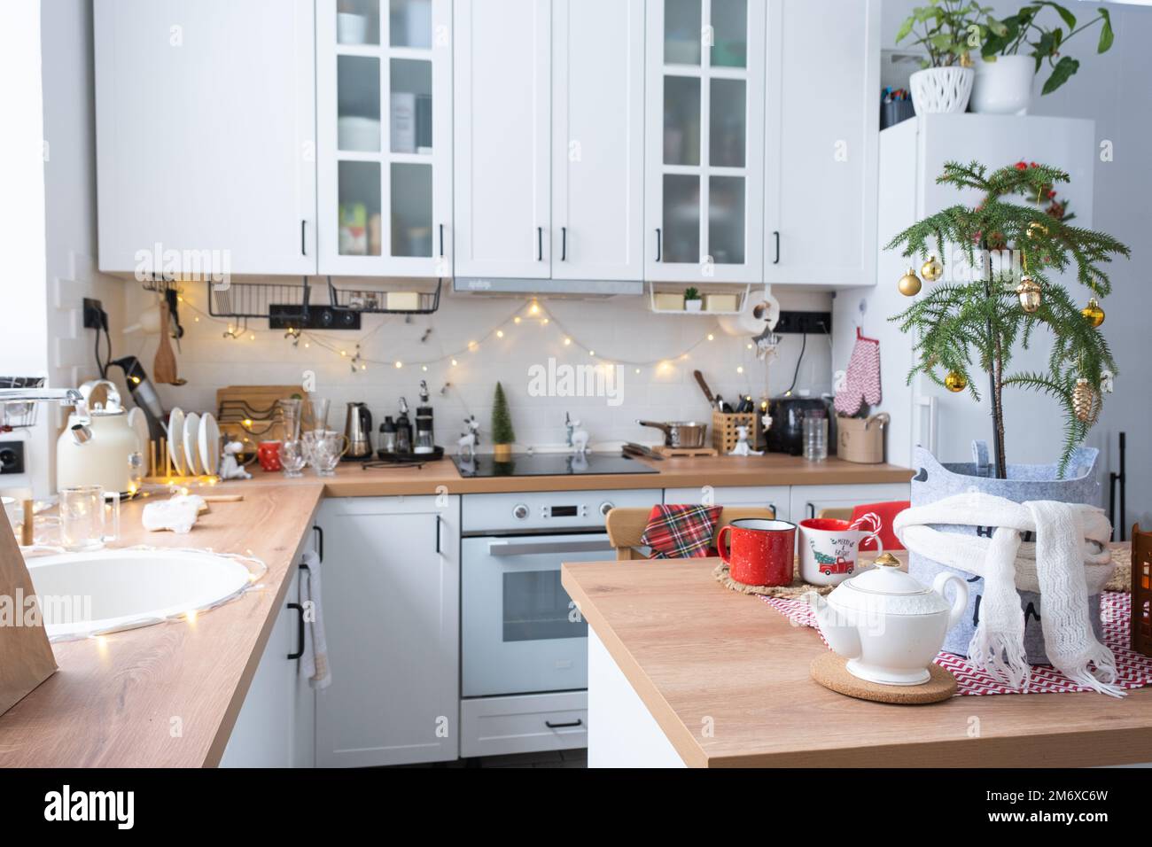 Festive Christmas decor in white kitchen, festive breakfast, white ...