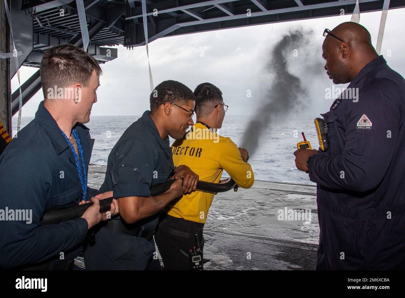 220509-N-BR419-1064 PACIFIC OCEAN (May 9, 2022) Sailors use a ...