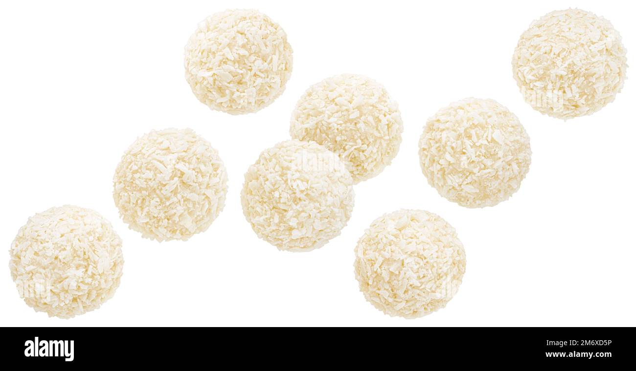 Falling coconut candies isolated on white background Stock Photo - Alamy