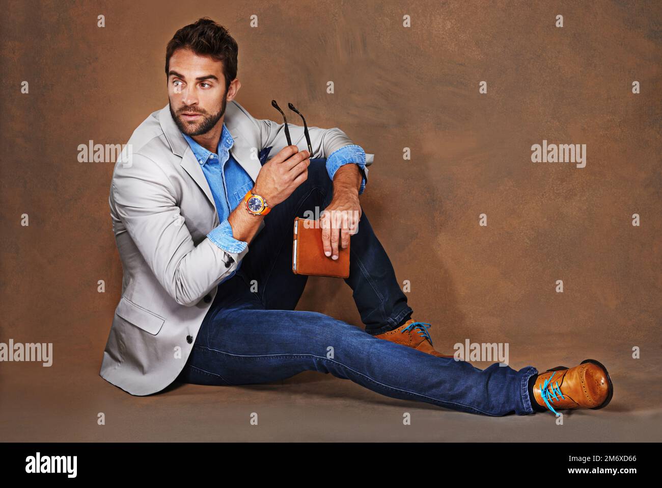 He clearly loves clothes and knows what suits him. a stylishly dressed ...