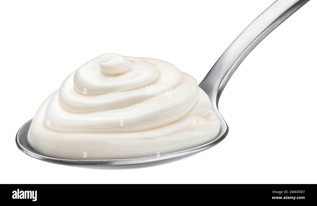 Whipped mascarpone cream in spoon isolated on white background Stock ...