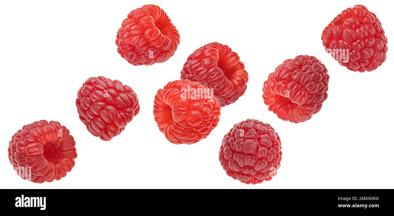 Falling raspberries isolated on white background Stock Photo - Alamy