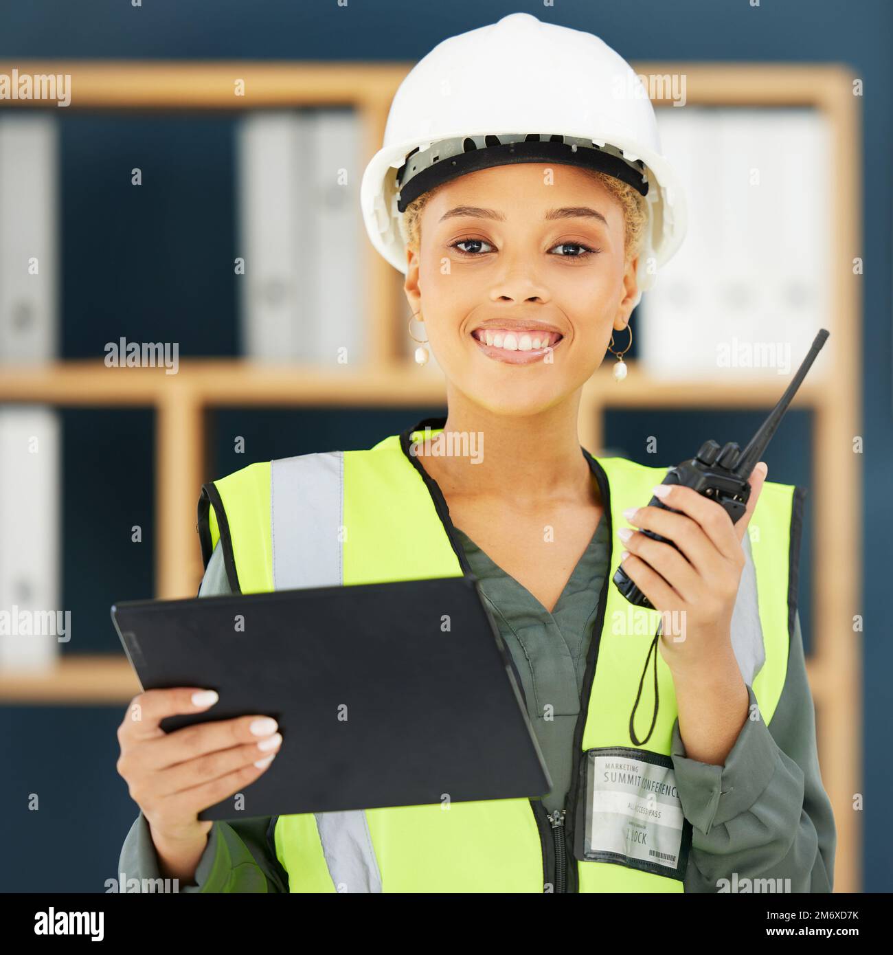 Construction, walkie talkie and portrait of black woman with tablet for ...