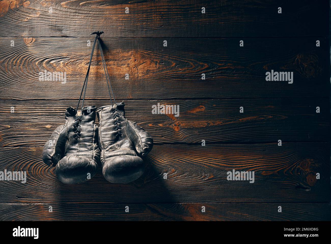 Vintage boxing gloves hanging on hi-res stock photography and images ...