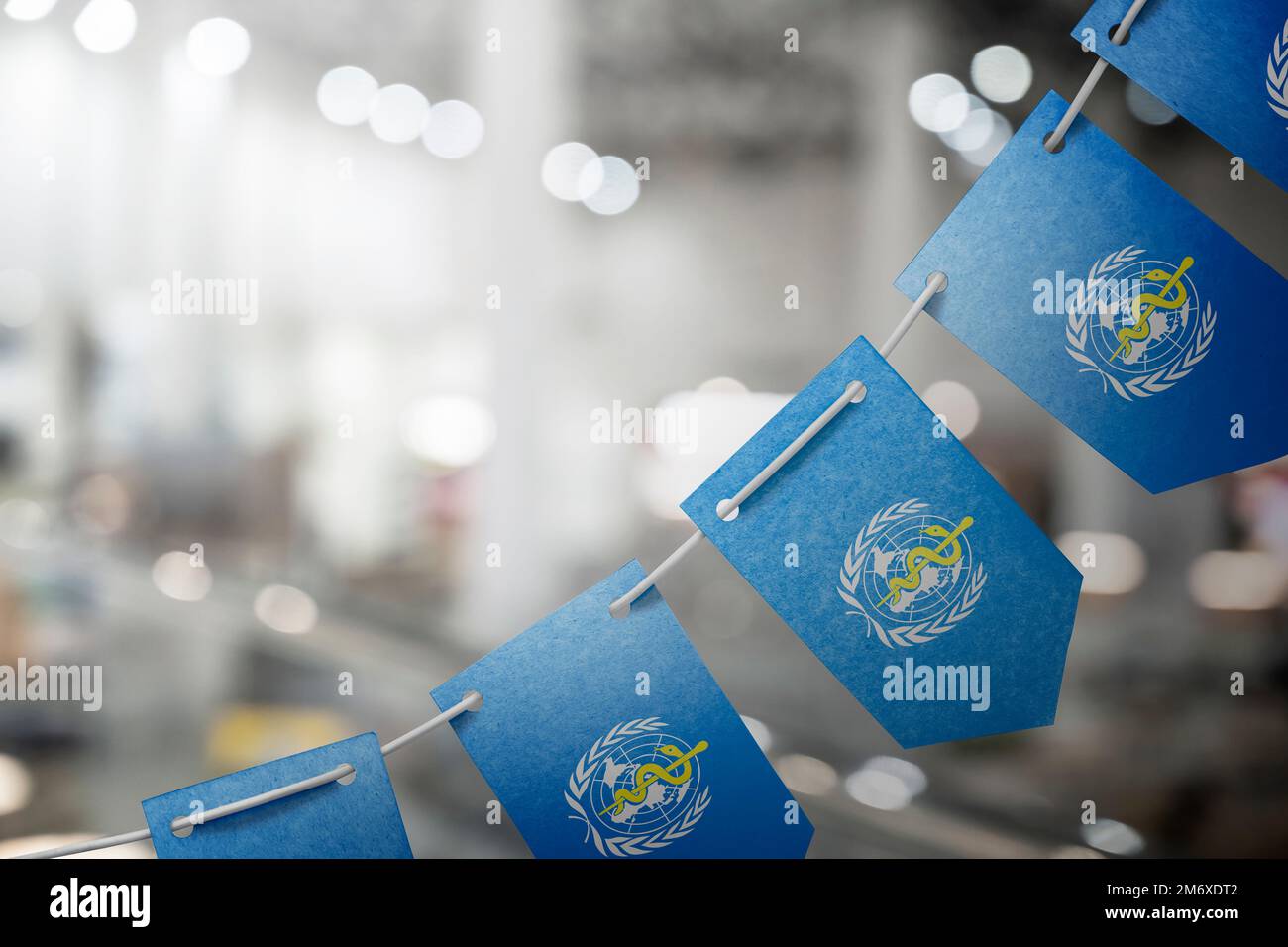 A garland of World Health Organization WHO national flags on an ...