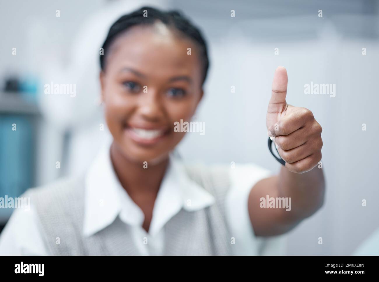 Thumbs up, success and hand of black woman in office for vision, goals ...