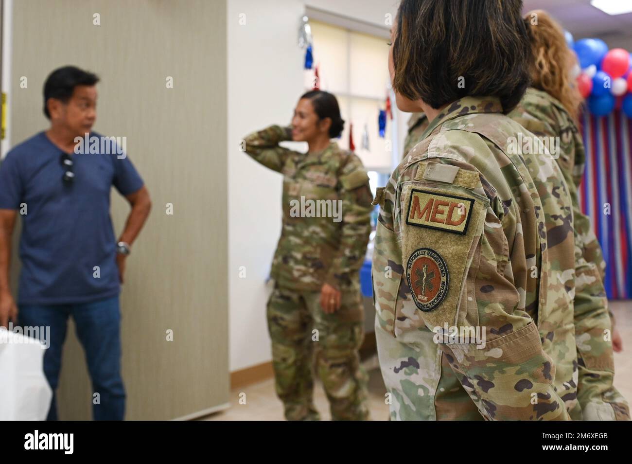 Rudy Paco, mayor of Mongmong-Toto-Maite, donates a roasted pig to the ...