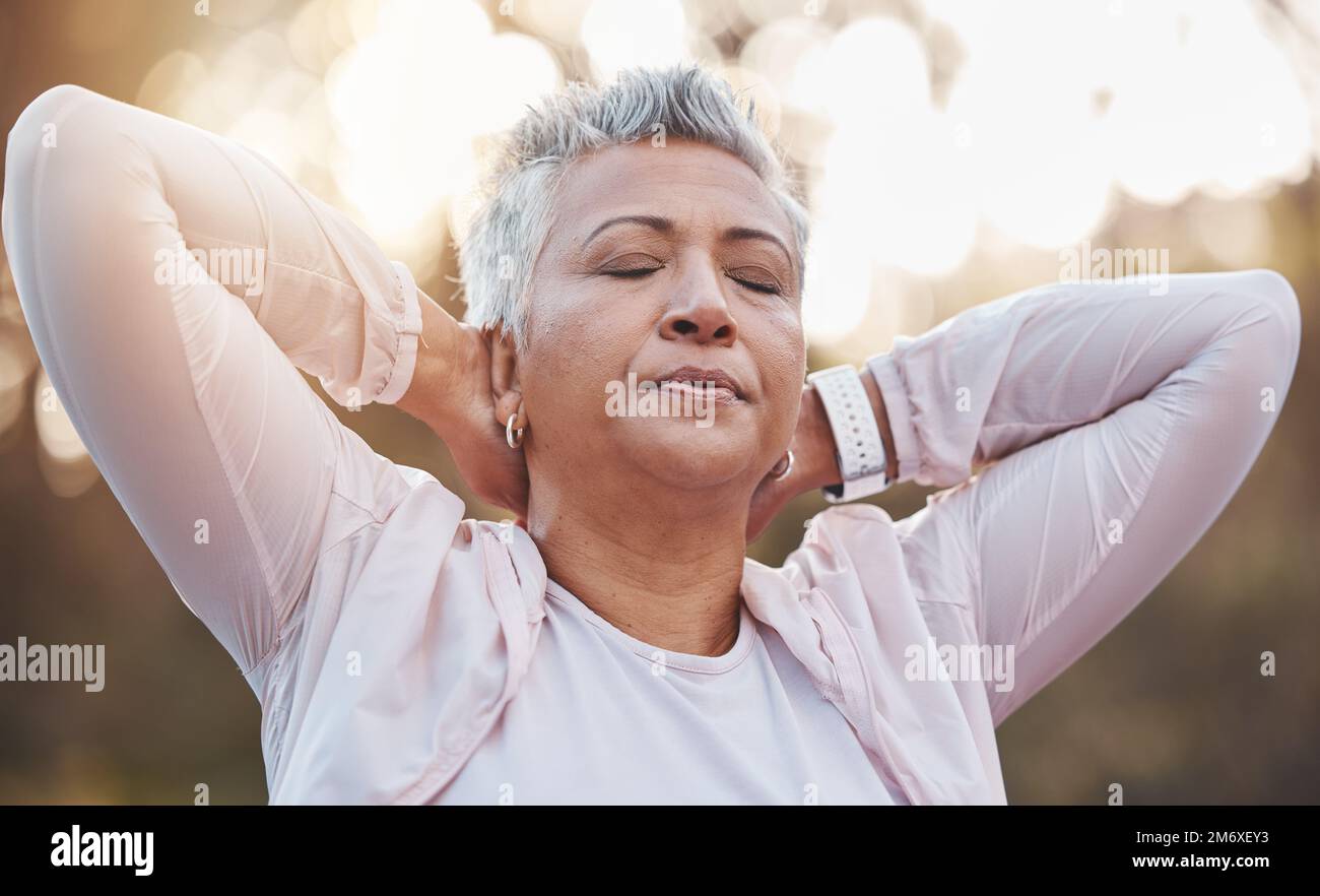 Senior woman, breathing and stretching arms outdoor for fitness ...