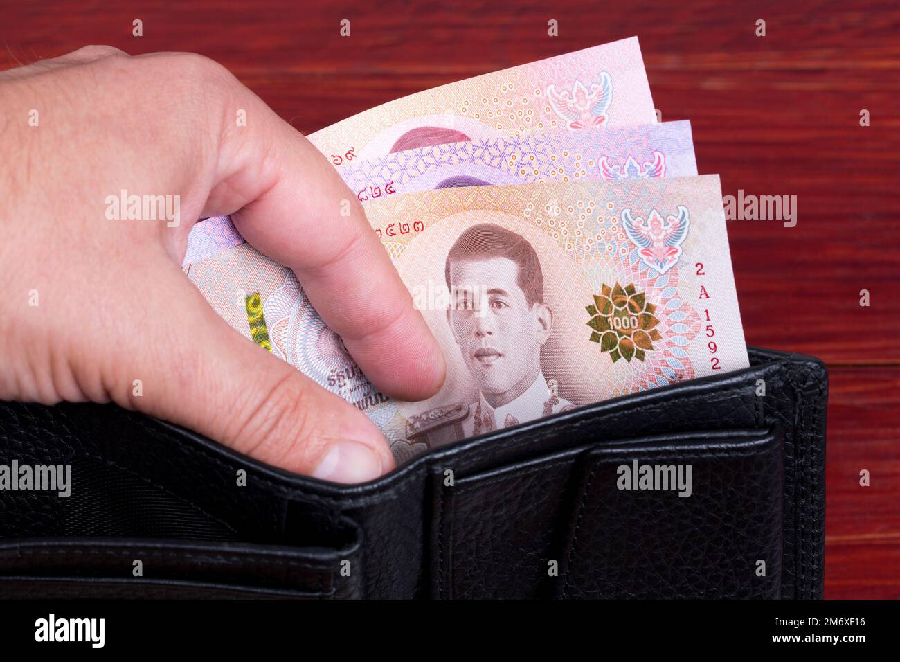 Thai baht banknotes hi-res stock photography and images - Alamy