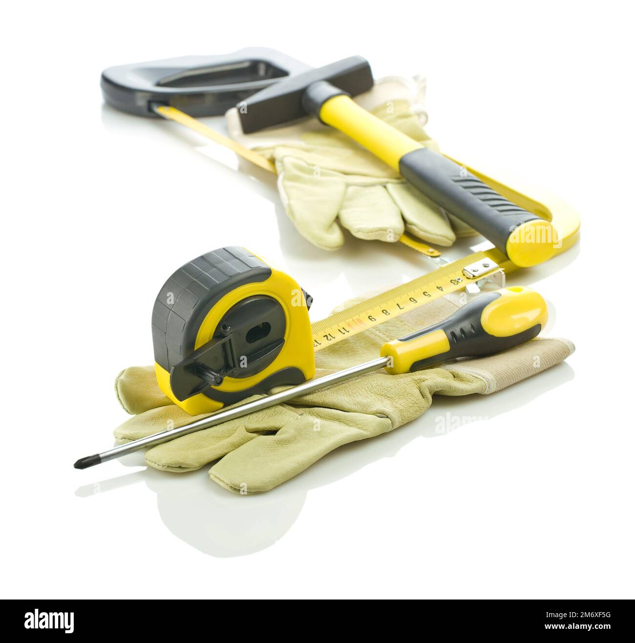 gloves with stack of tools Stock Photo - Alamy