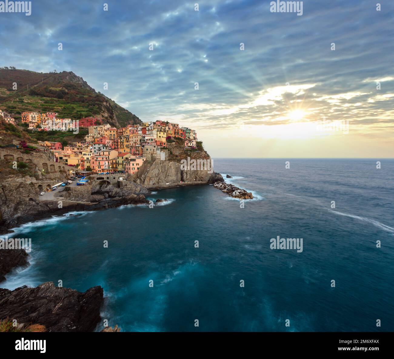 Beautiful summer Manarola - one of five famous villages of Cinque Terre ...