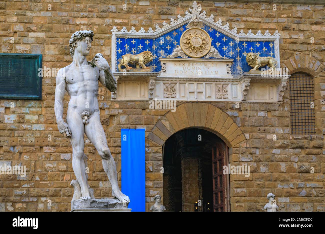 A reproduction of Michelangelo's sculpture of David in front of Palazzo ...