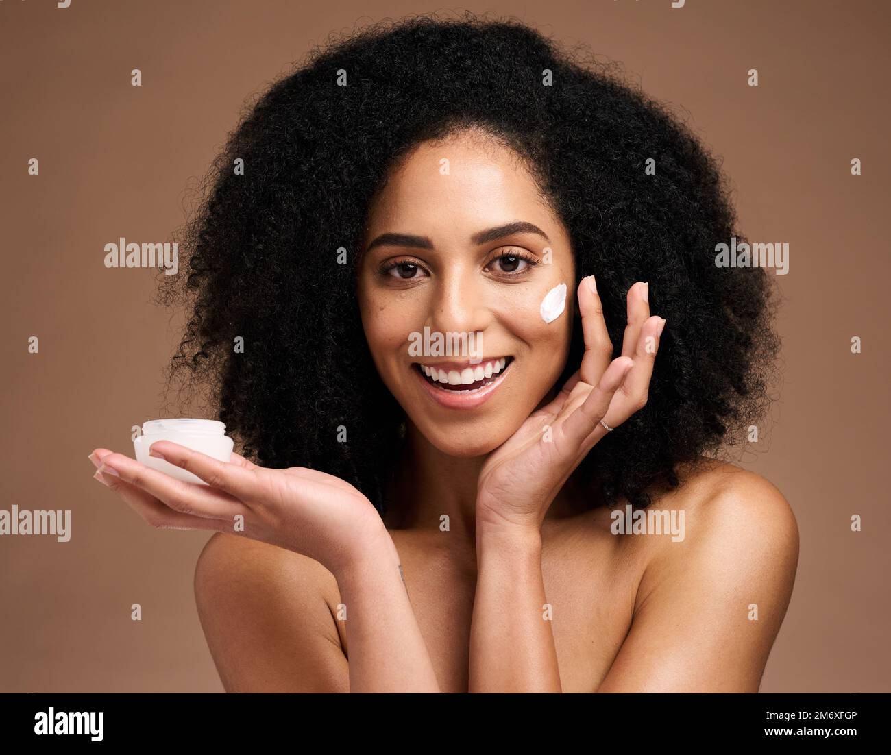 Cream product, studio and skincare woman in portrait for facial ...