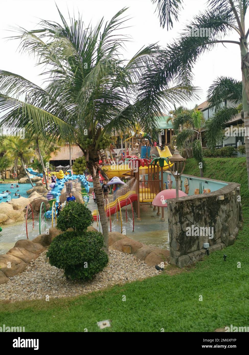 Perak, Malaysia. December 25,2022: Children and adult tourists enjoying ...