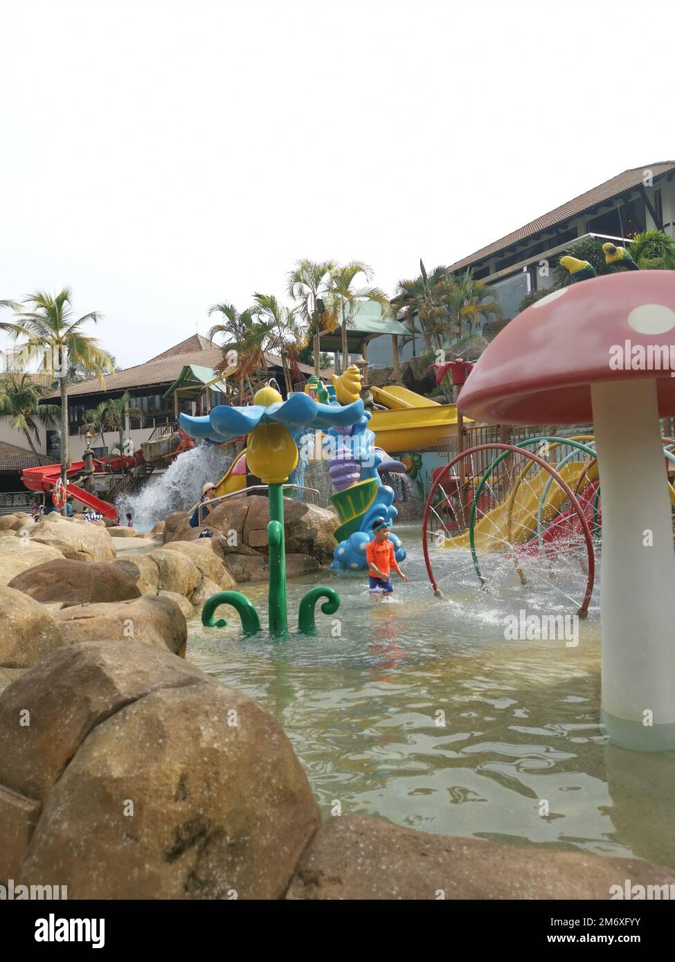 Perak, Malaysia. December 25,2022: Children and adult tourists enjoying ...