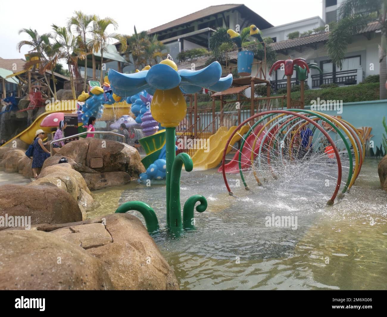 Perak, Malaysia. December 25,2022: Children and adult tourists enjoying ...