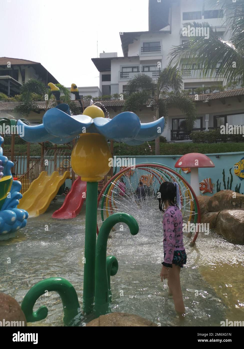 Perak, Malaysia. December 25,2022: Children and adult tourists enjoying ...