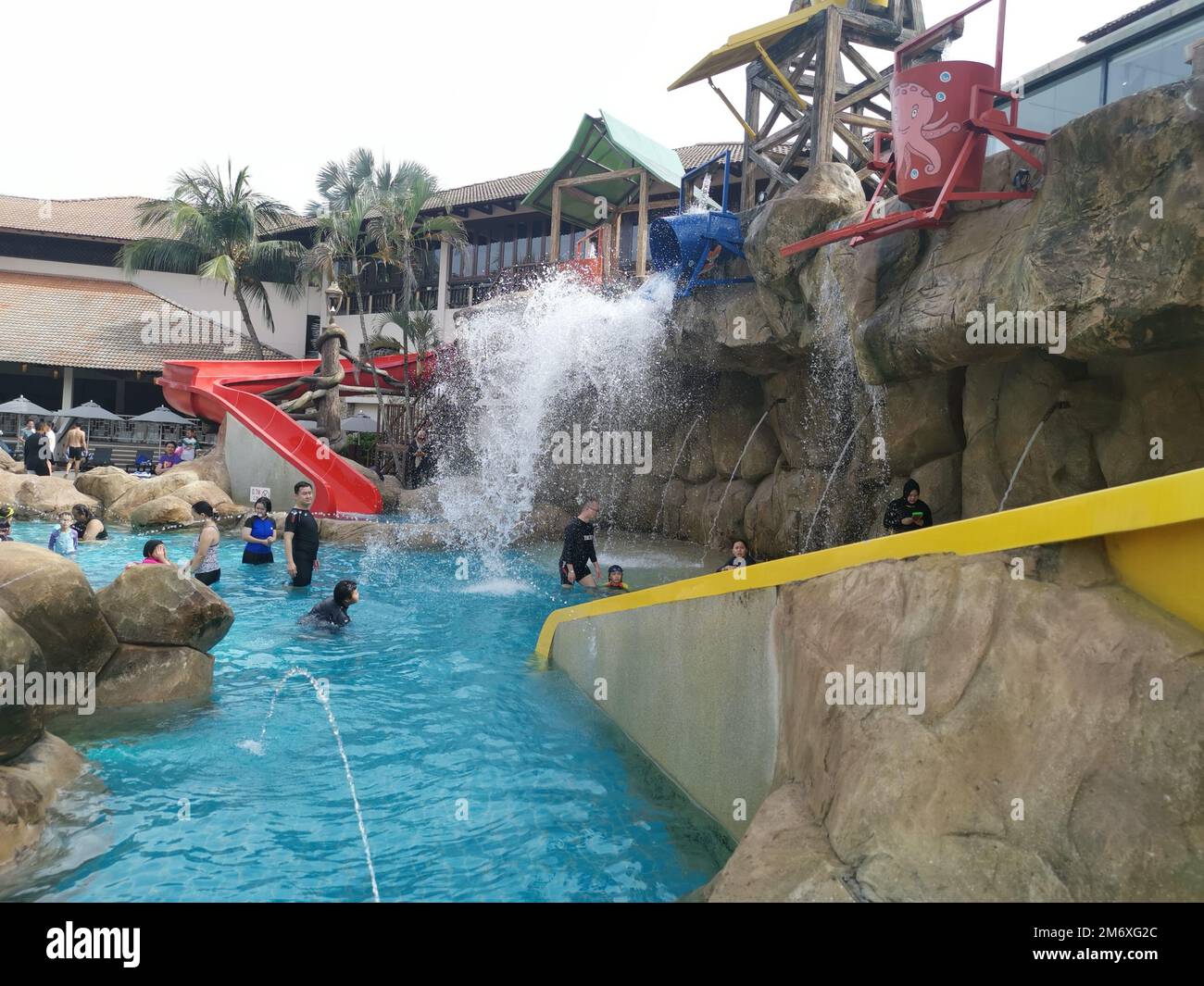 Perak, Malaysia. December 25,2022: Children and adult tourists enjoying ...