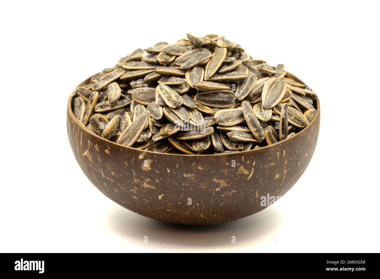 Shelled sunflower seeds isolated on white background. Salted sunflower ...