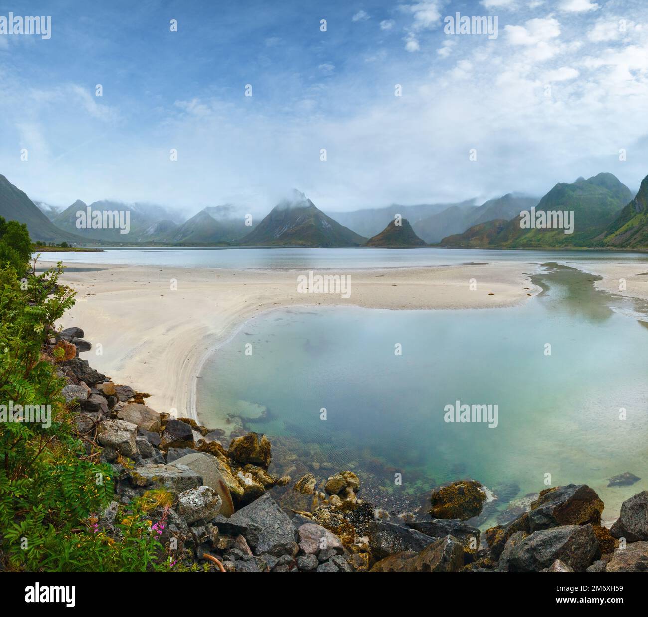 Norwegian Sea cloudy night view with sandy beach (not far Vagan, Norway ...
