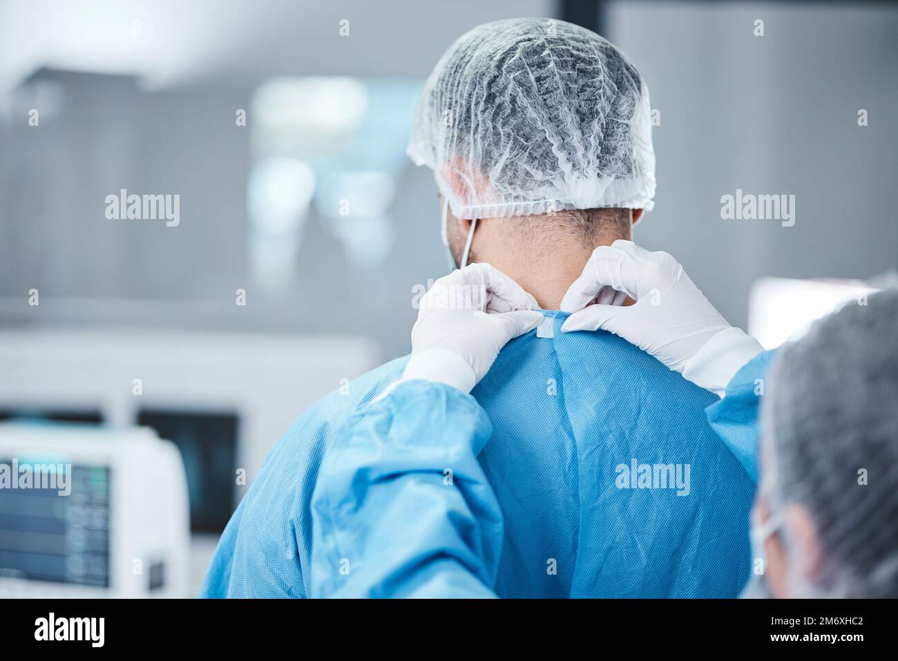 Surgeon, scrubs and uniform to prepare for surgery, operation and and ...