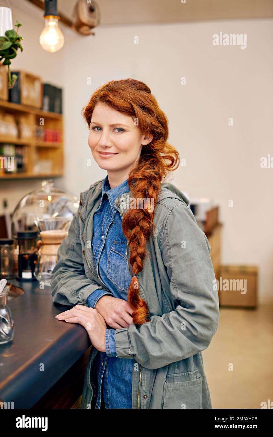 Need my cup of joe. an attractive young woman in a coffee shop Stock ...