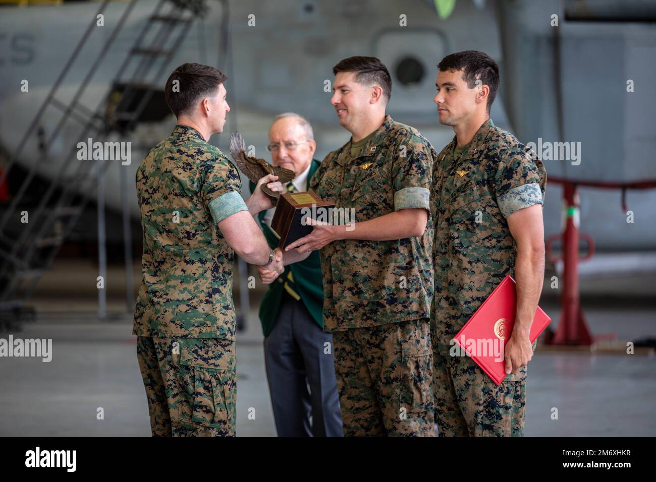 U.S. Marine Corps Lt. Col. Ryan A. Ferrel, left, commanding officer of ...