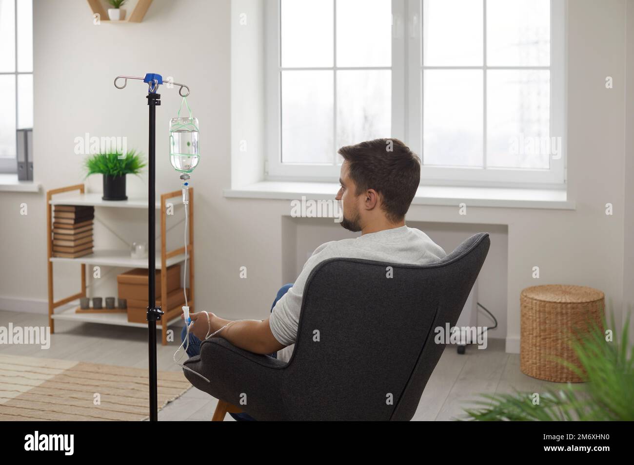 Rare view of male patient receiving intravenous treatment Stock Photo ...