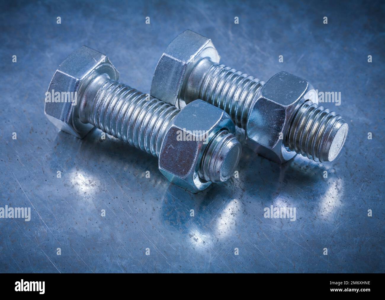 Composition of threaded bolts and construction nuts on metallic ...