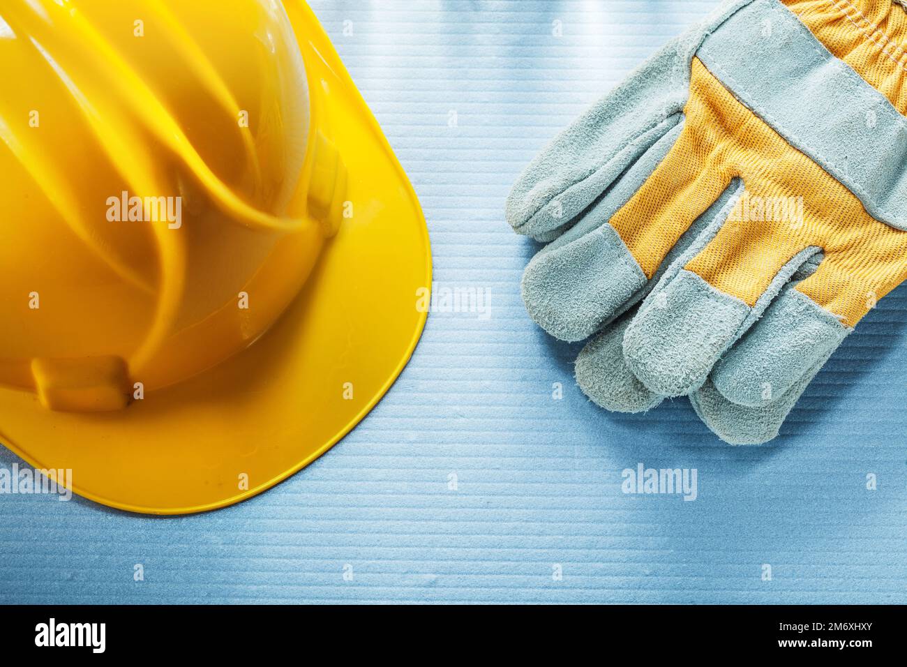 Hard hat safety gloves hi-res stock photography and images - Alamy