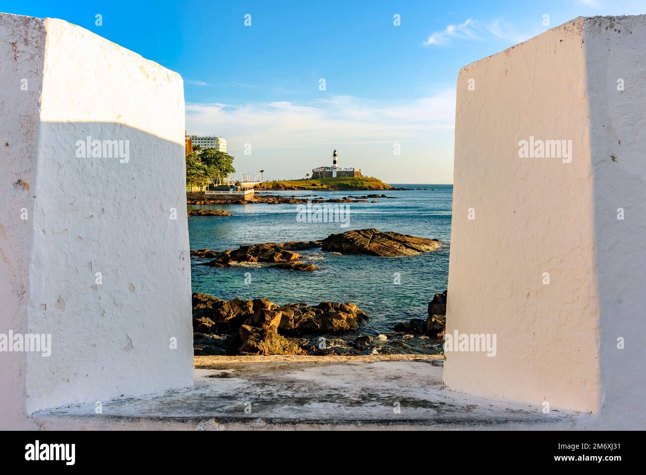 Famous Barra Lighthouse seen through the walls of the fortress of Santa ...