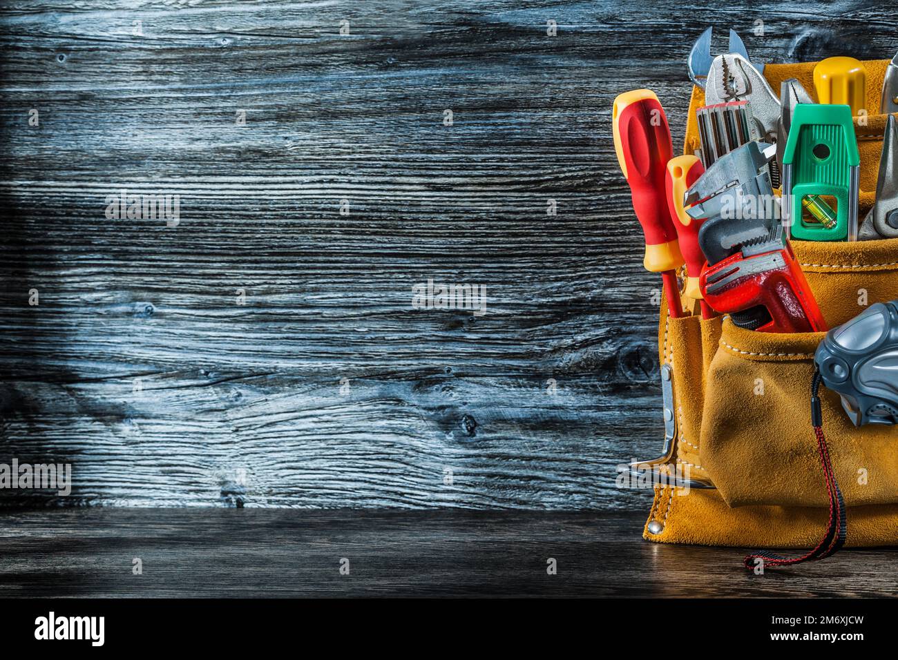 copyspace image set of construction tools in leather toolbelt Stock ...