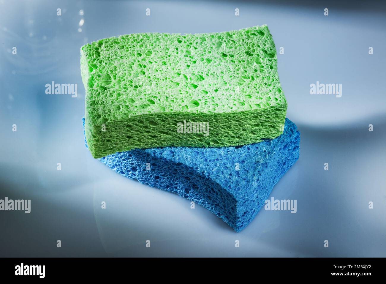 Dishwashing sponges on white background Stock Photo - Alamy