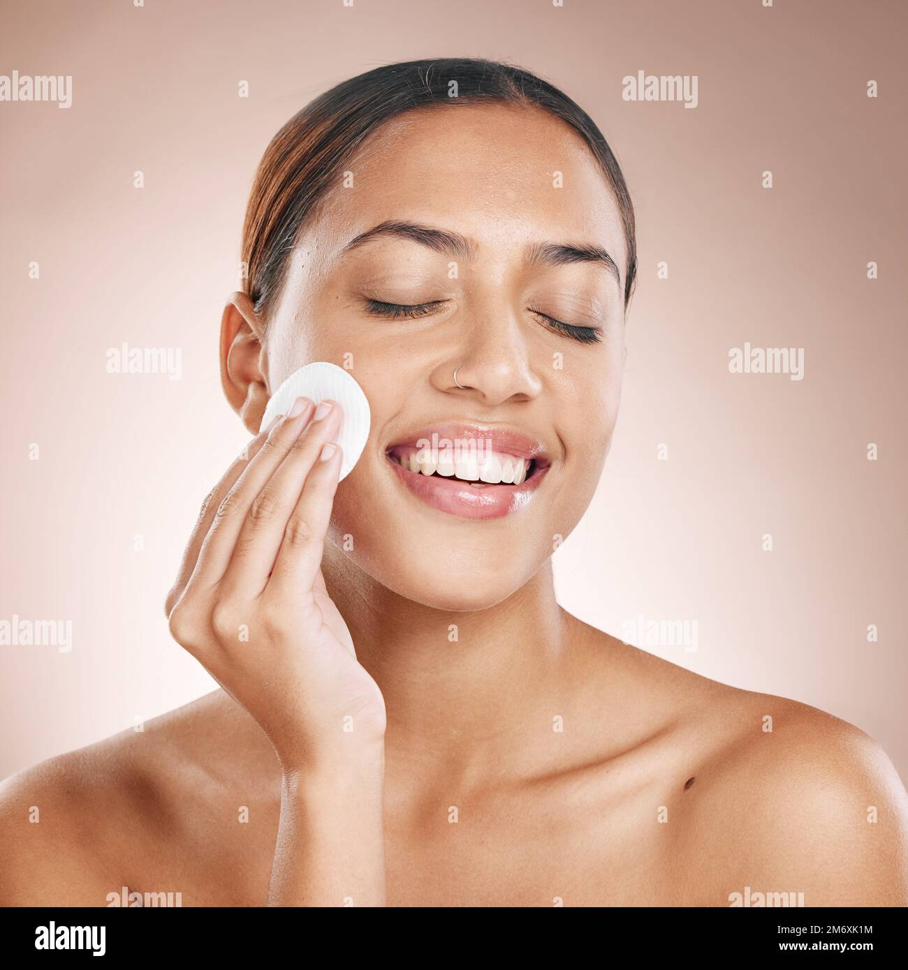 Beauty, woman and cotton pad with face and facial treatment, wellness ...