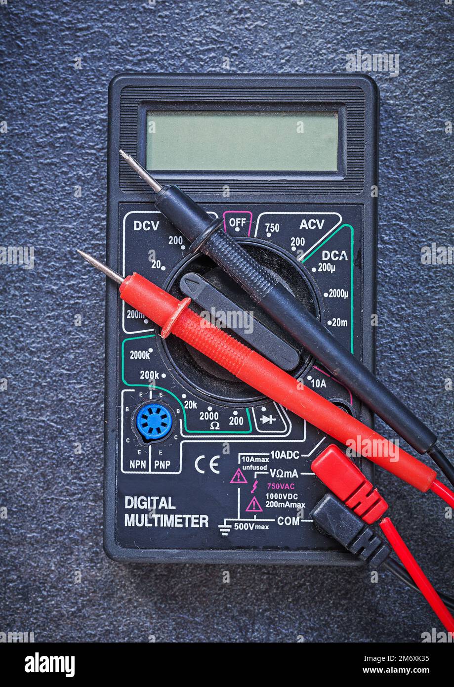 Digital multimeter electric tester on black background electricity ...