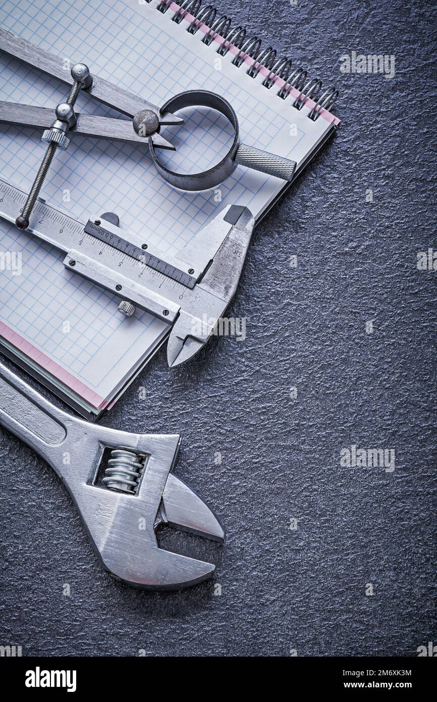 Divider vernier scale adjustable spanner notebook construction concept ...