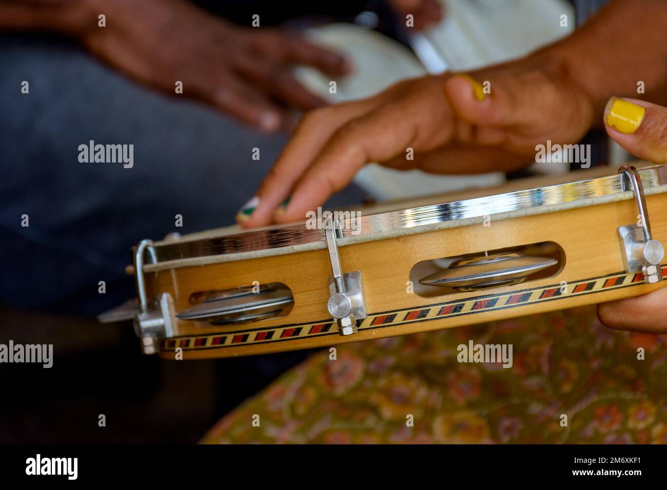 Percussionist playing tambourine during brazilian carnival Stock Photo ...